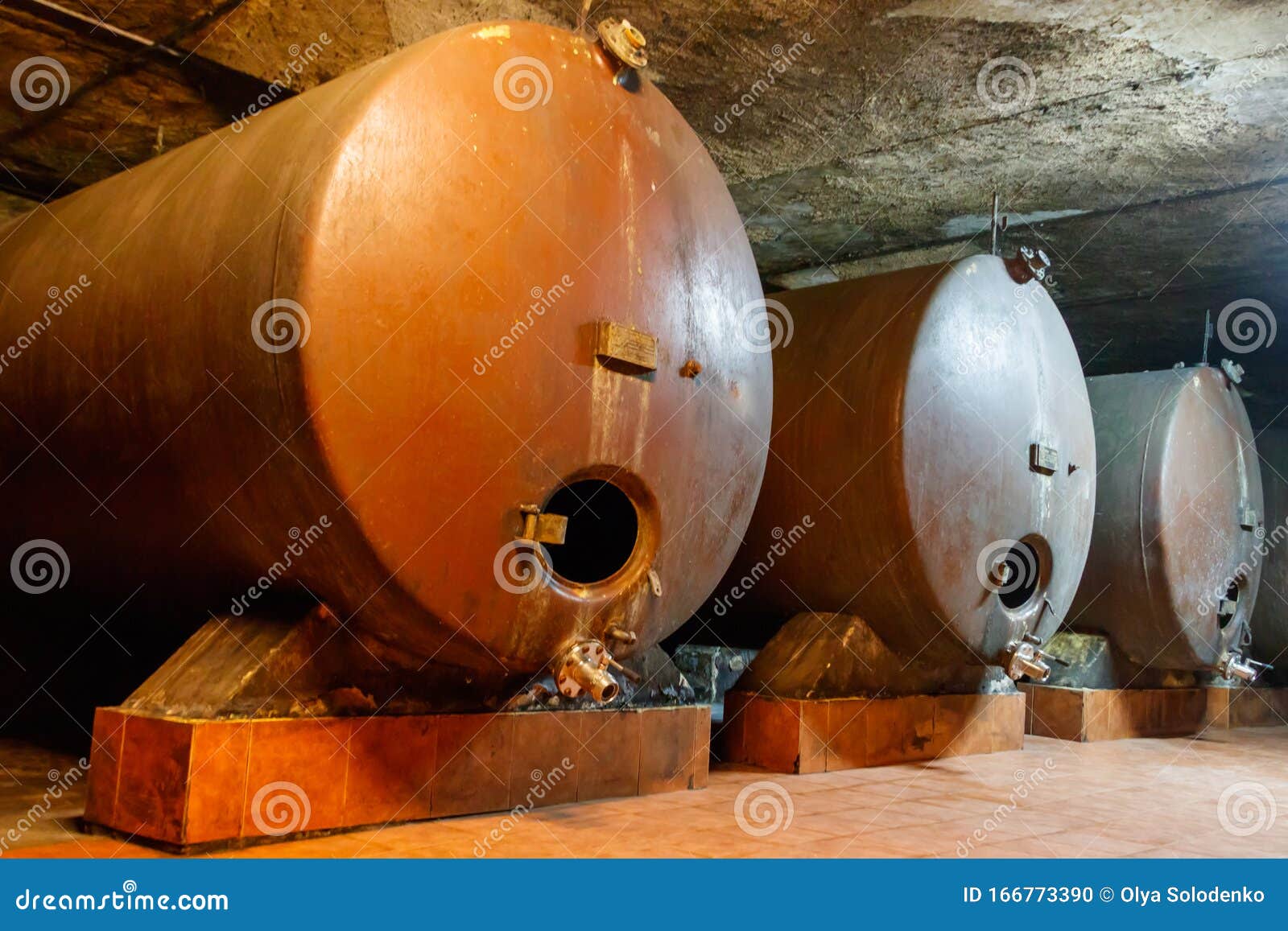 Large Storage Tanks Where Grape Juice is Aged into Wine Located in a ...