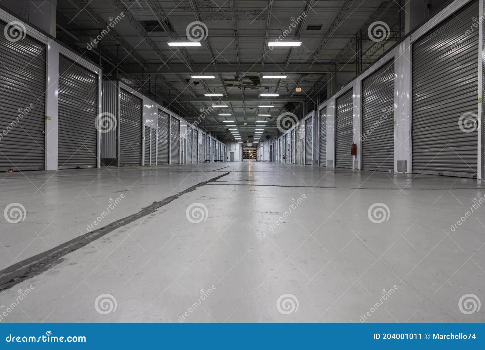 Large Storage Warehouse Corridor Interior. Metal Garage Doors Stock ...