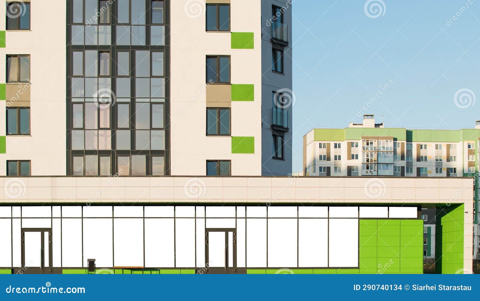 A Large Store Built Next To a New Multi-storey Building Stock Photo ...