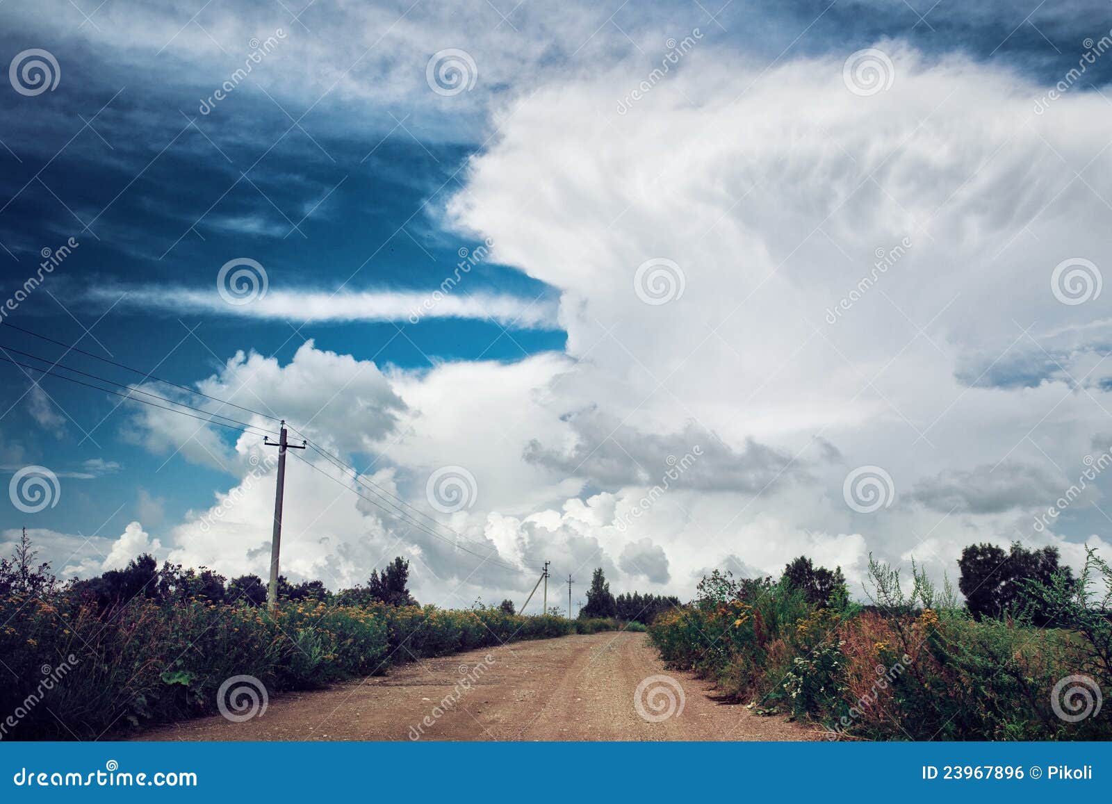 Large Storm Cloud Hovering Over Road Stock Photo - Image of sand ...