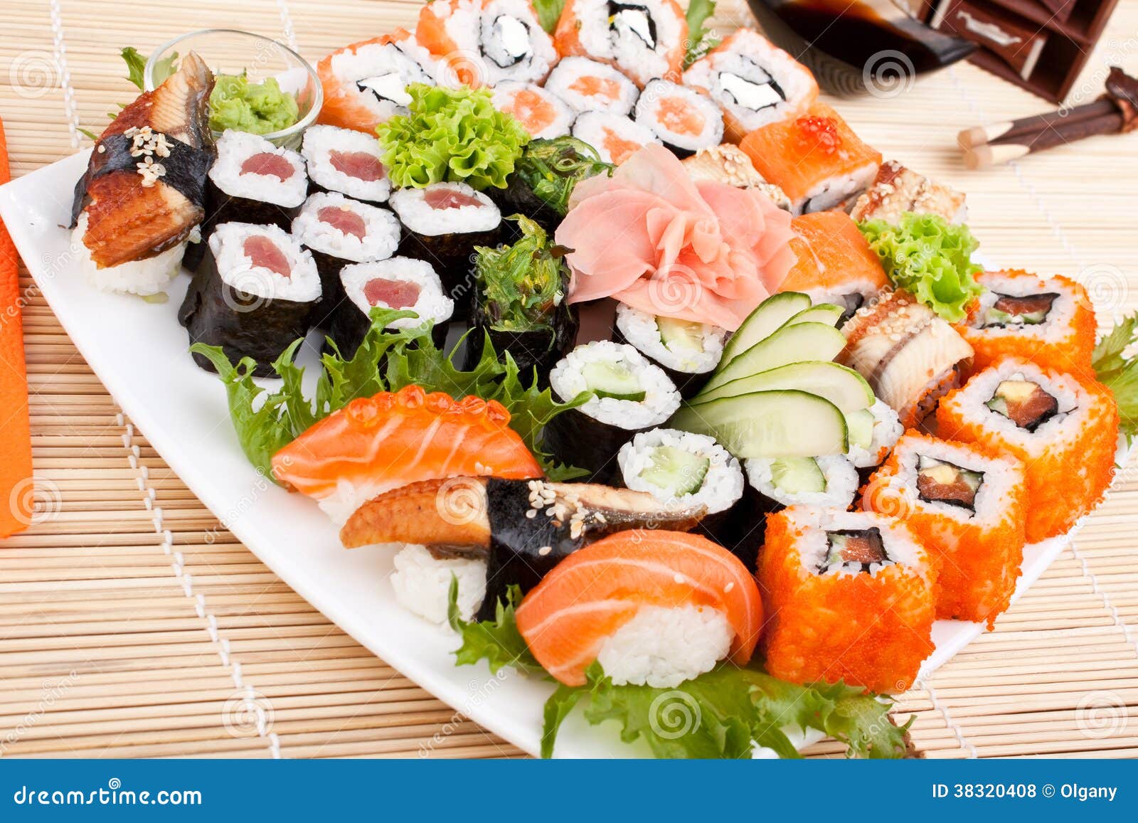 Large Sushi Place on a White Square Plate Stock Photo - Image of ...