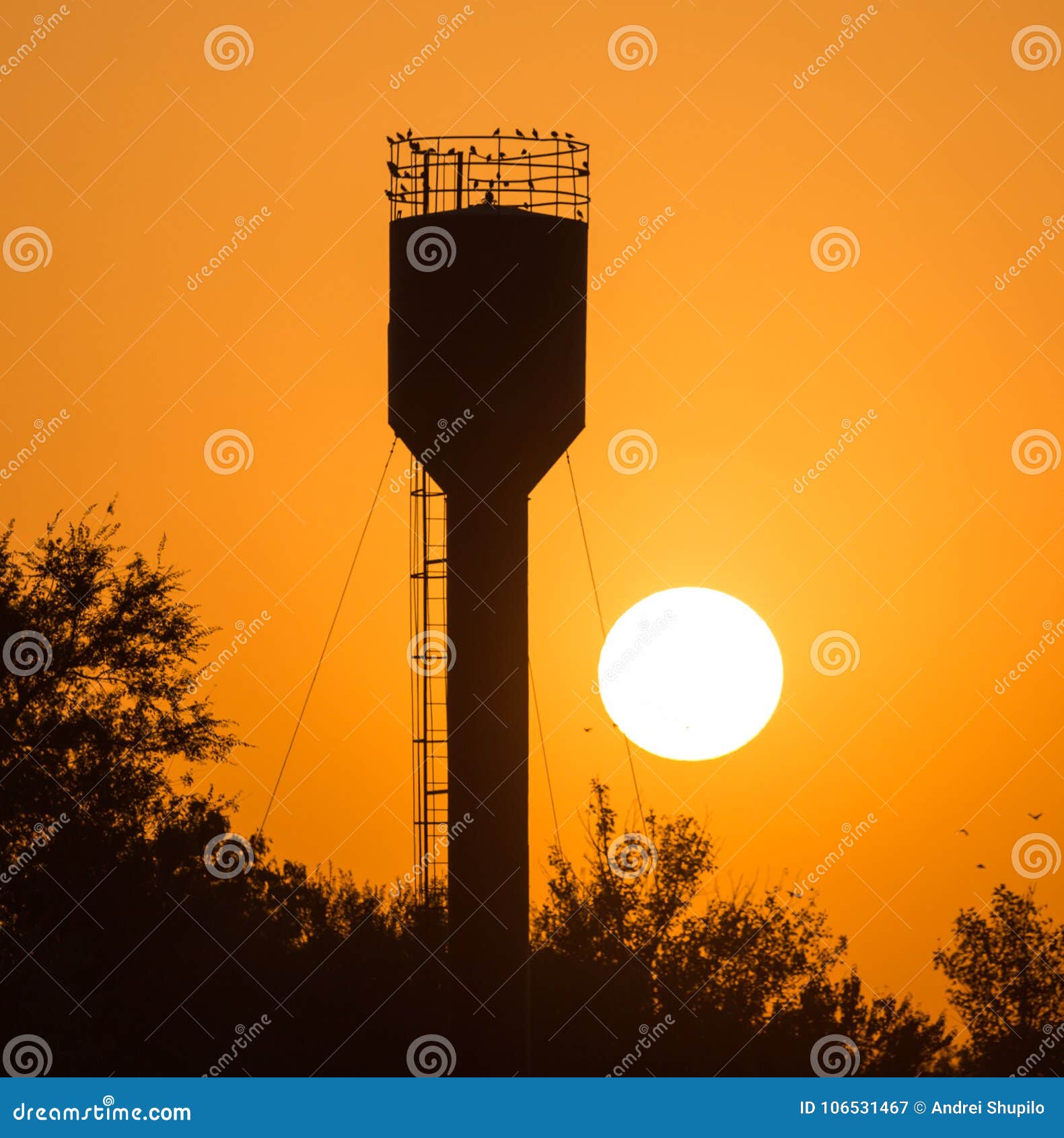 A large tank at sunset stock image. Image of tank, steel - 106531467