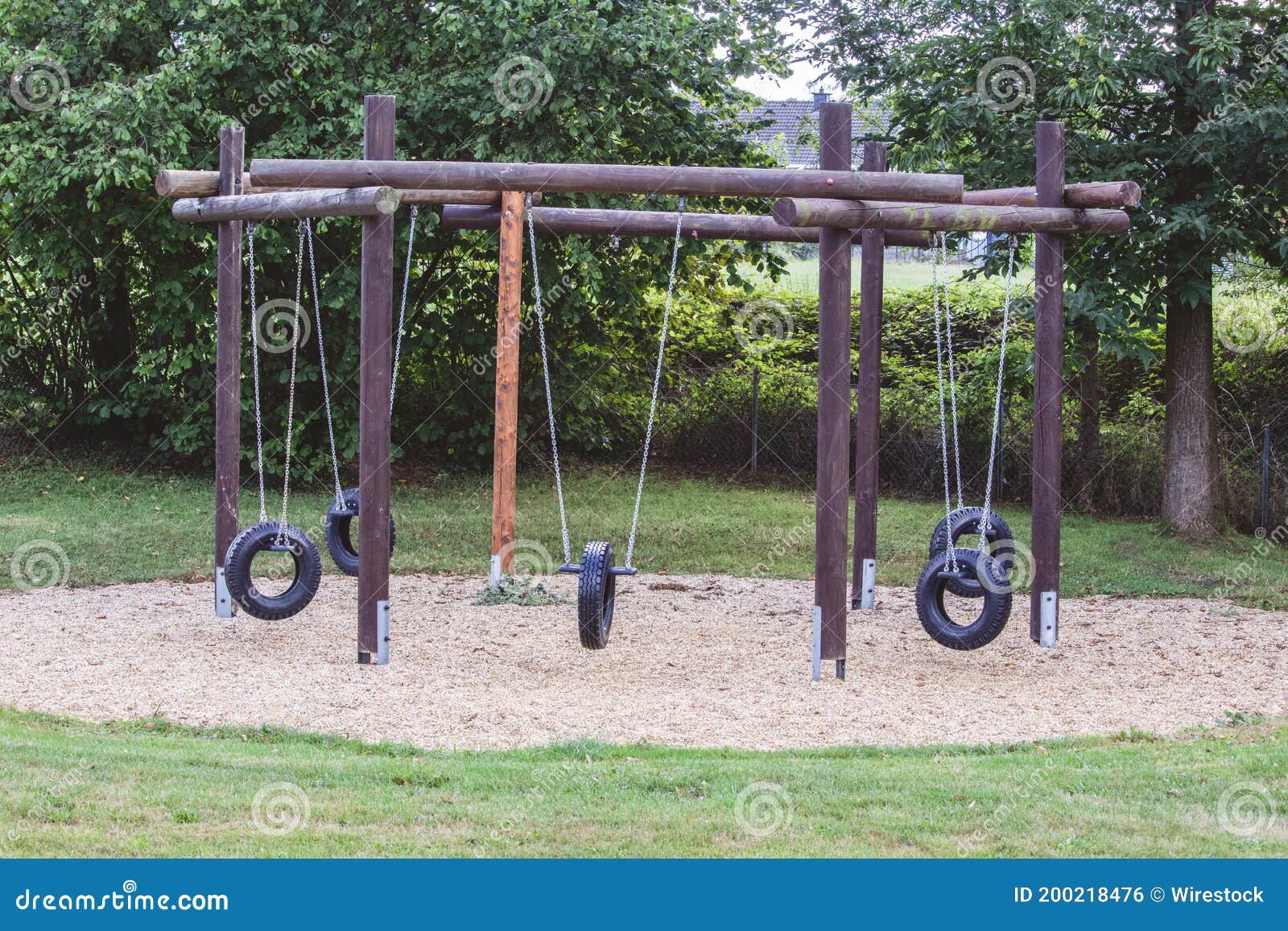 Large Tire Swing in a Playground Stock Photo - Image of swings ...