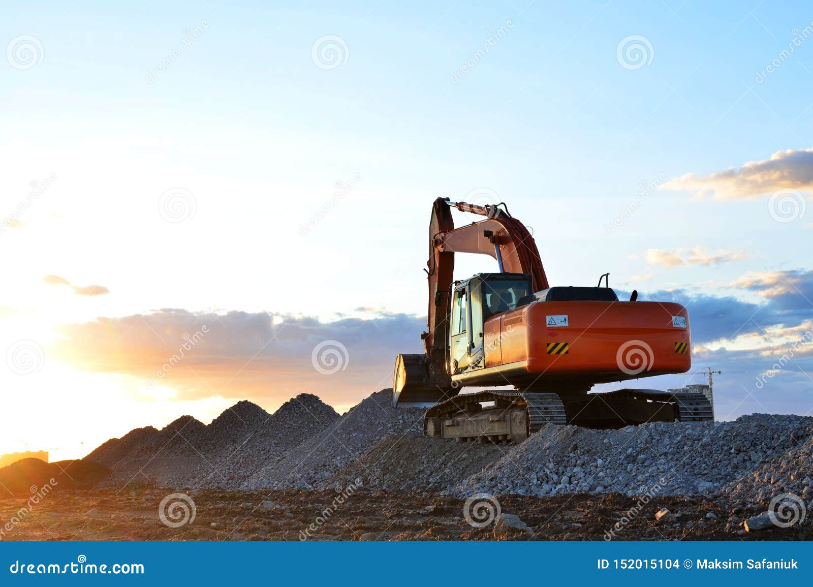 Large Tracked Excavator Works in a Gravel Pit. Stock Photo - Image of ...