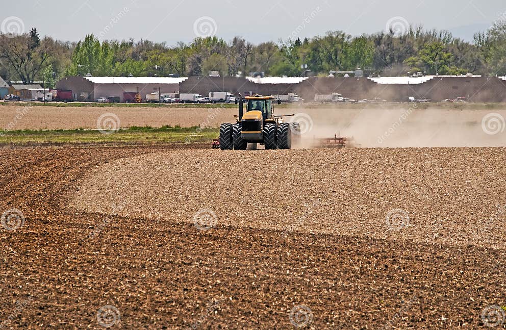 Large Tractor Harrowing a Field Stock Image - Image of farm, land: 23633197