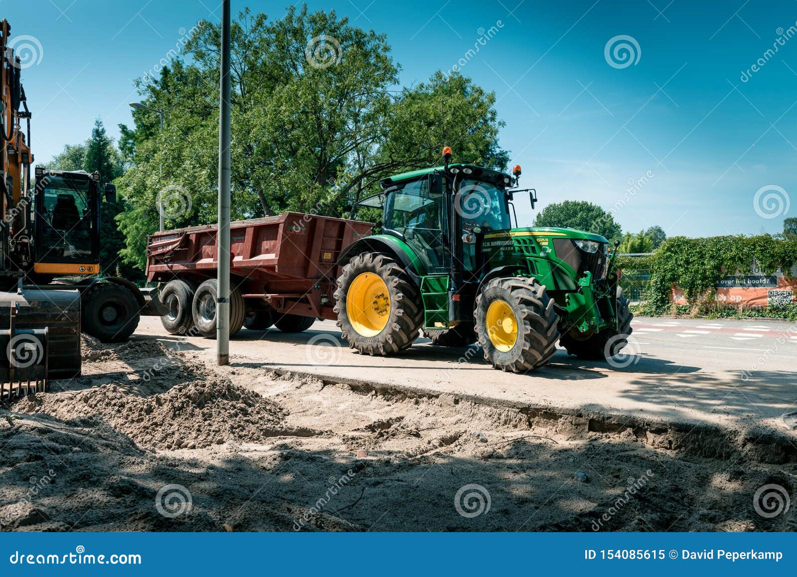 Large Tractor with a Trailer, Work on the Road Editorial Image - Image ...