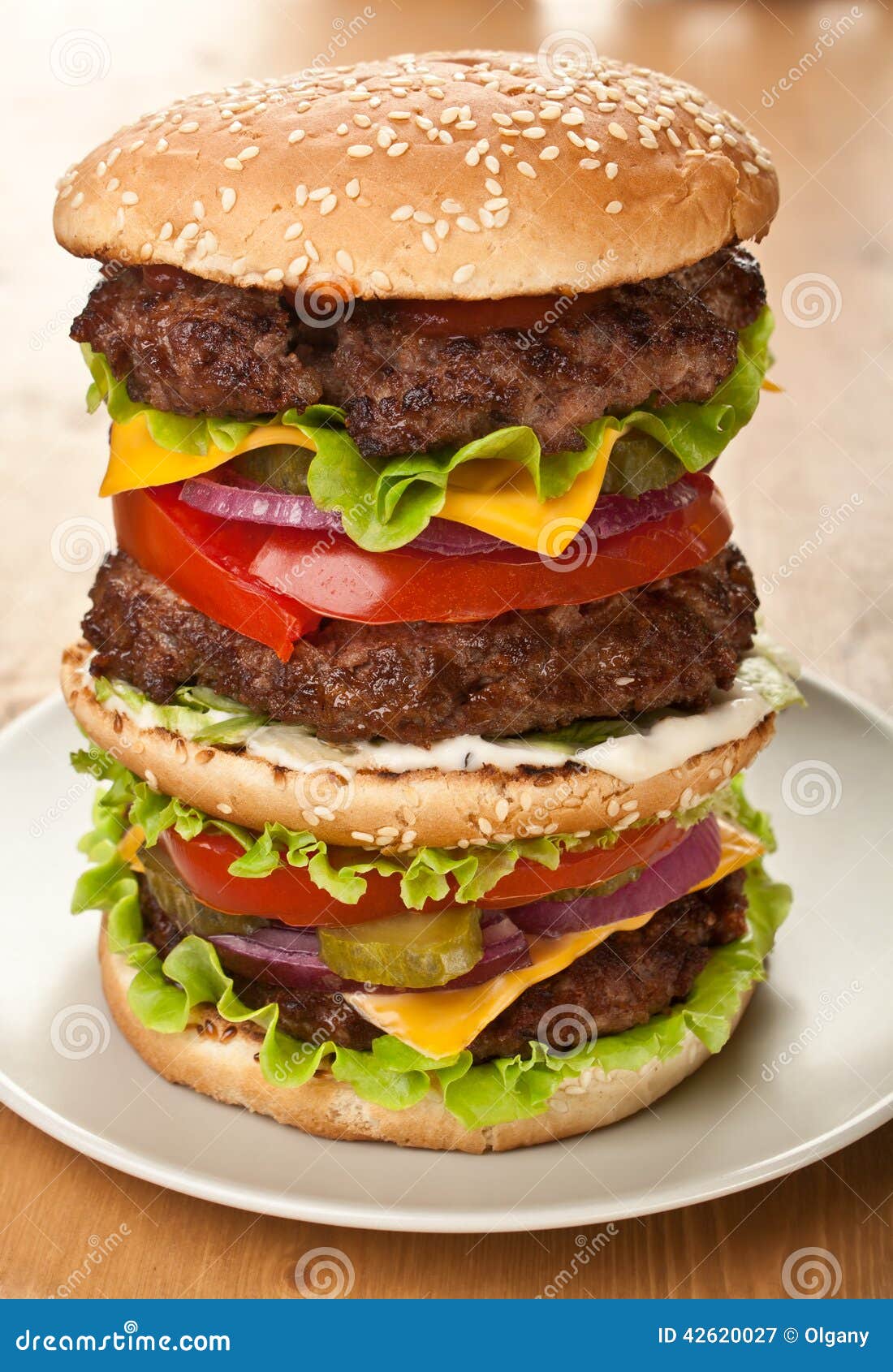 Large Triple Cheeseburger stock image. Image of grilled - 42620027