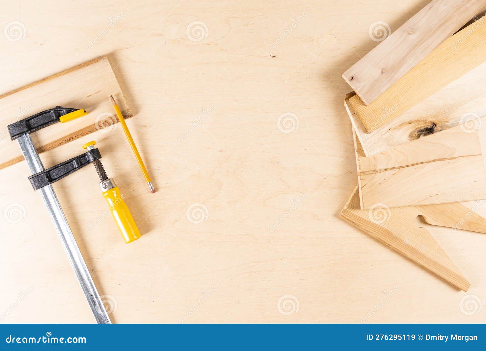 Large Variety of Separate Lineup of Assorted Working Tools on Wood ...