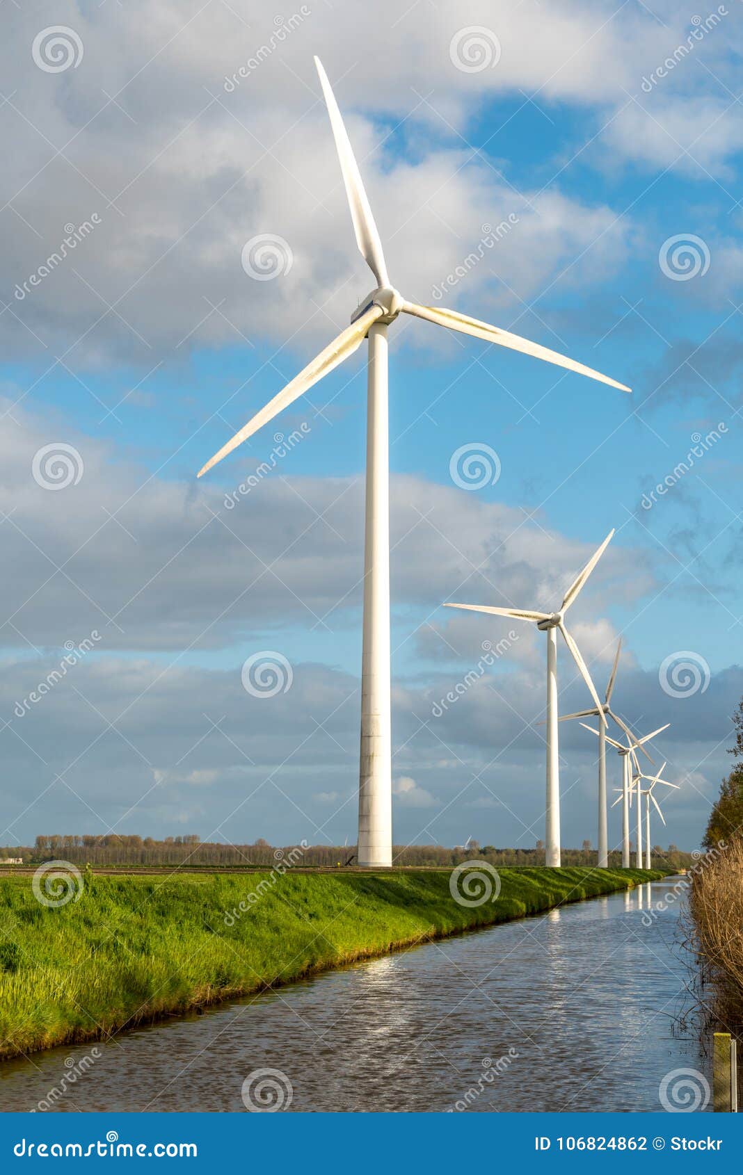 Windmills on the field stock photo. Image of conservation - 106824862