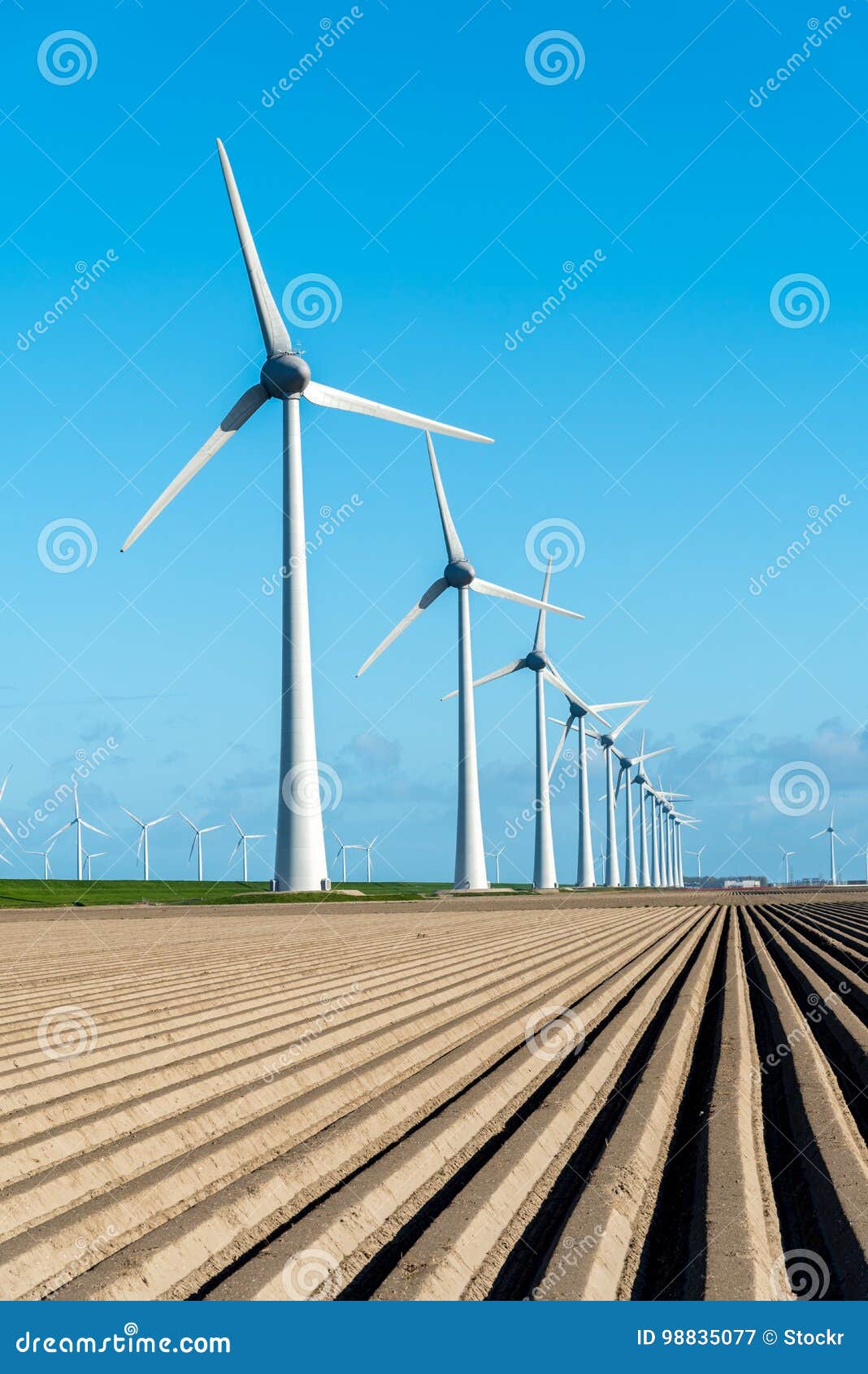 Windmills on the field stock image. Image of landscape - 98835077