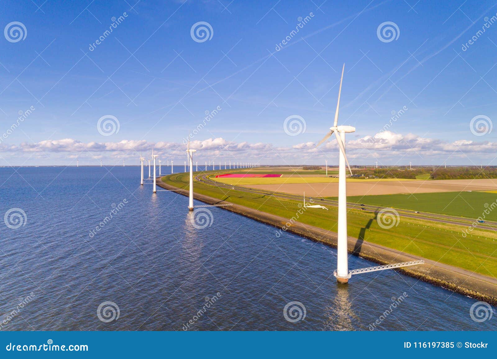 Windmills in the ocean stock image. Image of perspective - 116197385