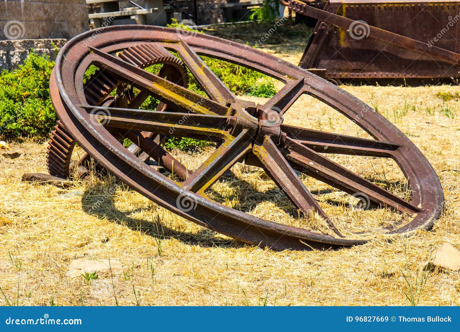 Large Vintage Mining Wheels with Ore Cart Carrier in Background Stock ...