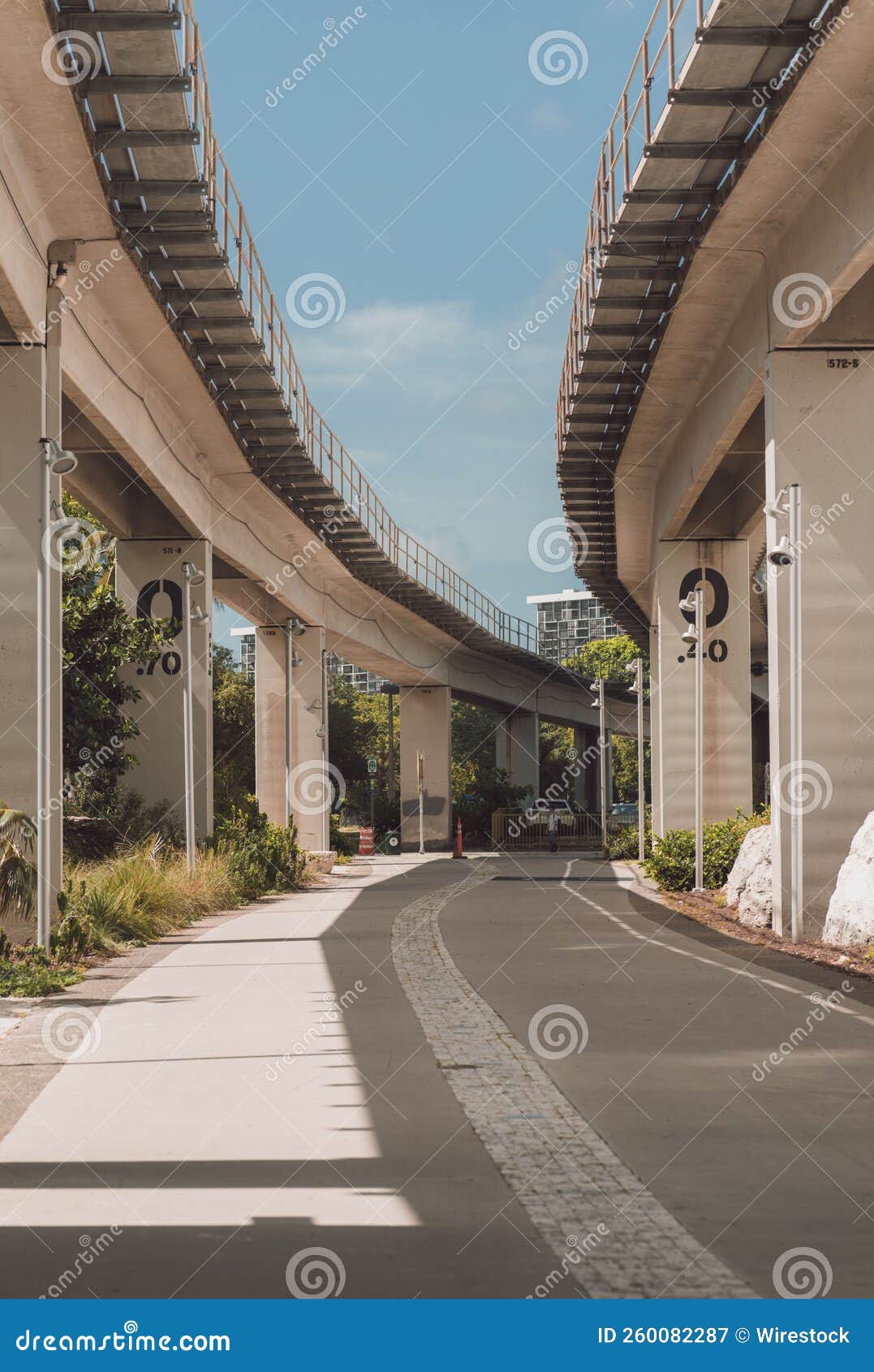 Large Walkway between Two Tall Parallel Buildings Stock Image - Image ...