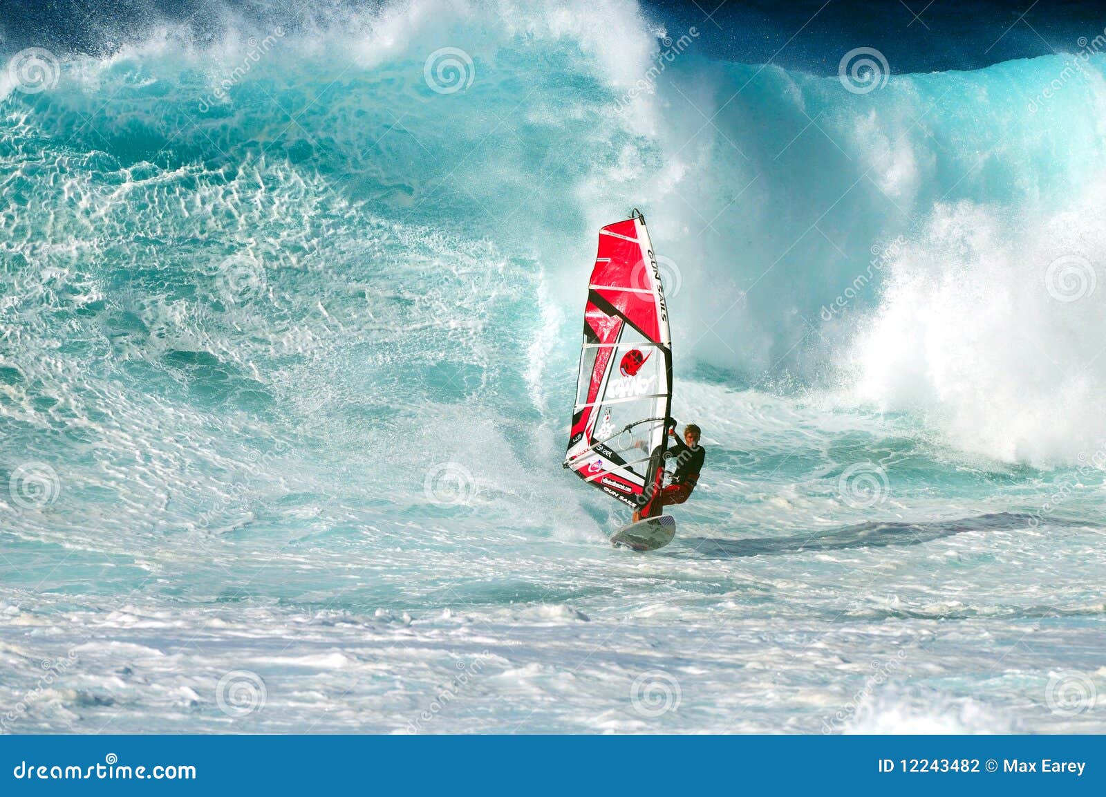 Large wave and windsurfer editorial photography. Image of crashing ...