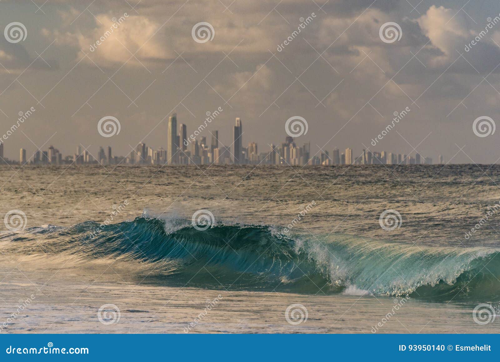 Large Waves with Gold Coast Cityscape on the Background Stock Photo ...