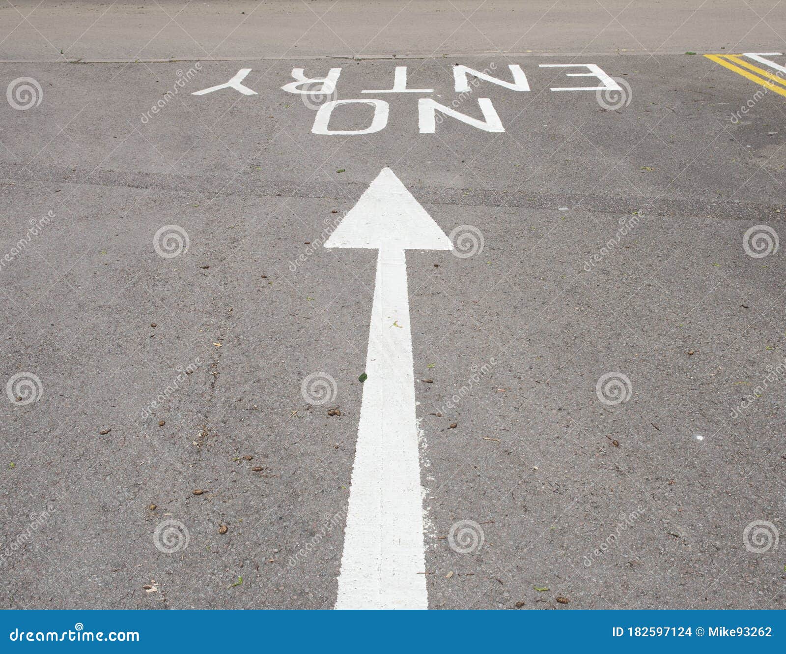No Entry in White Paint on Road with an Arrow Pointing Away from the ...