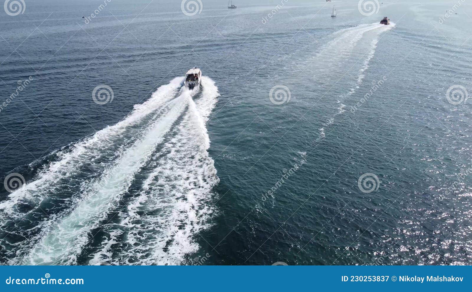 A Large White Boat is Moving at Speed on the Blue Sea Water Stock Image ...