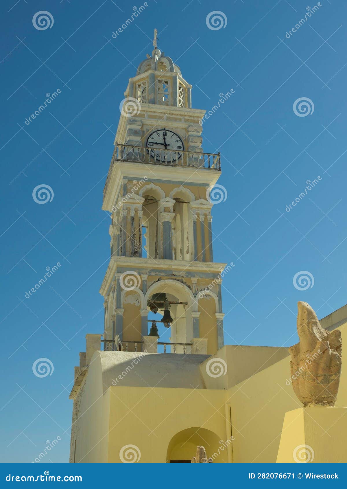 A Large White Clock Tower with a Tower in the Background Stock ...