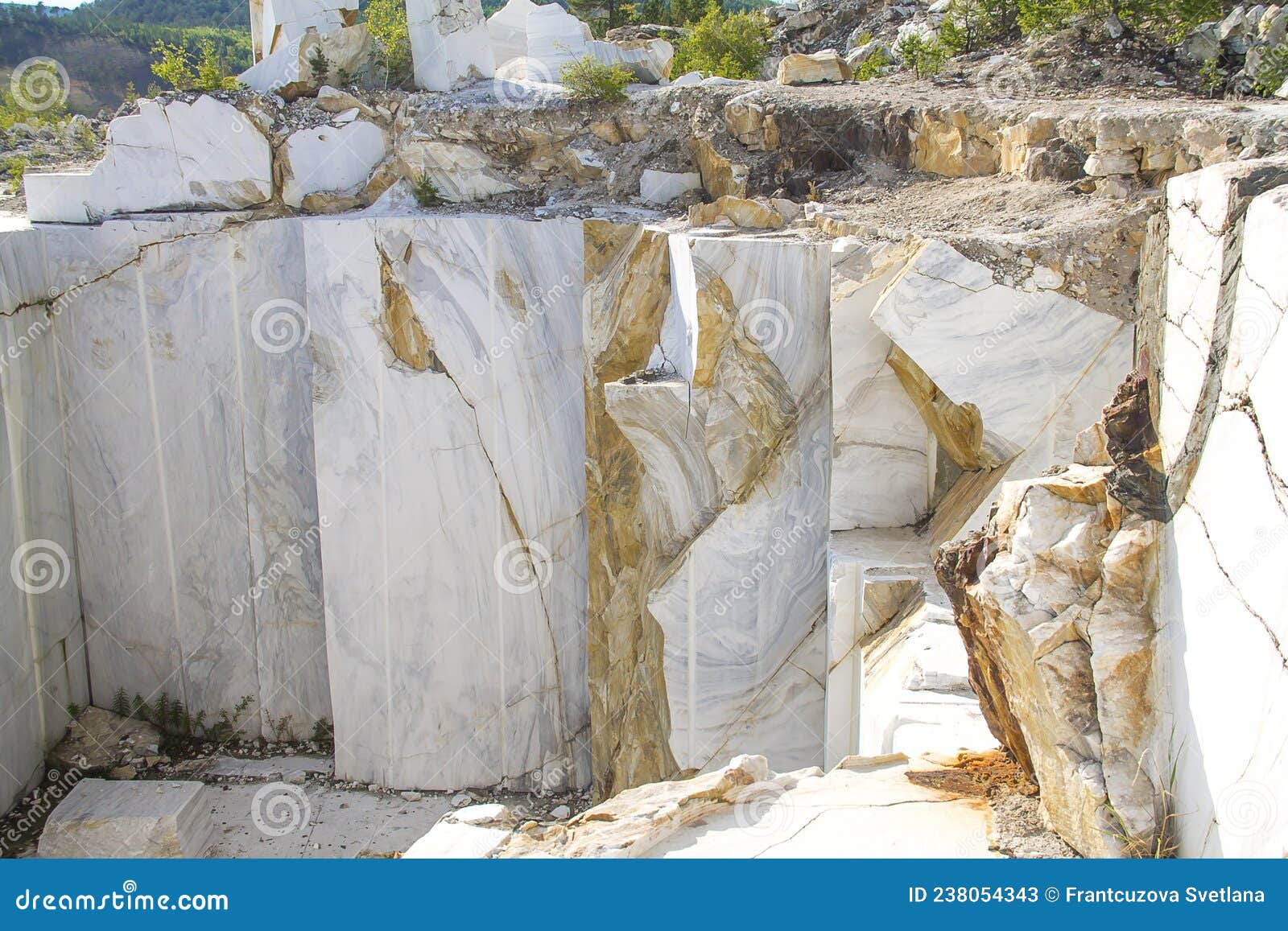 Large White Marble Stones in an Old Abandoned Quarry. White Marble ...