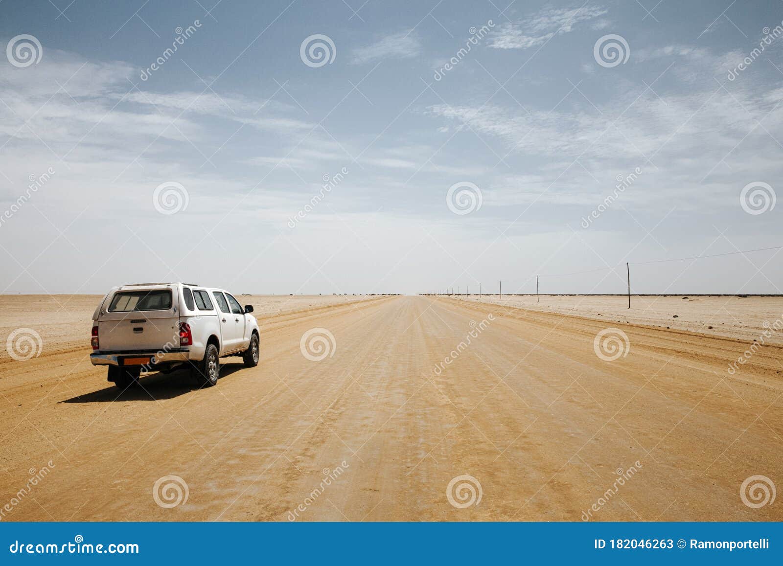 Large White Offroad Vehicle Parked by the Side of the Road in the ...