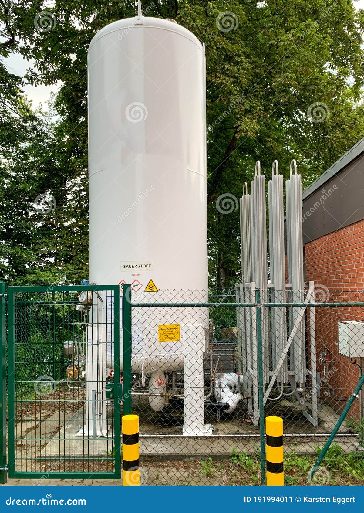 Large White Oxygen Tank is Standing on the Grounds of a Hospital Stock ...