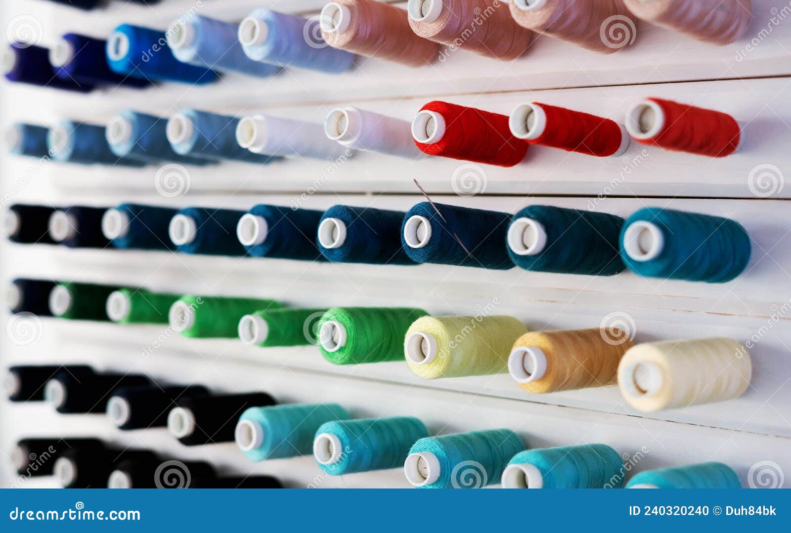 Large White Stand with Spools of Multi-colored Thread. Stock Photo ...