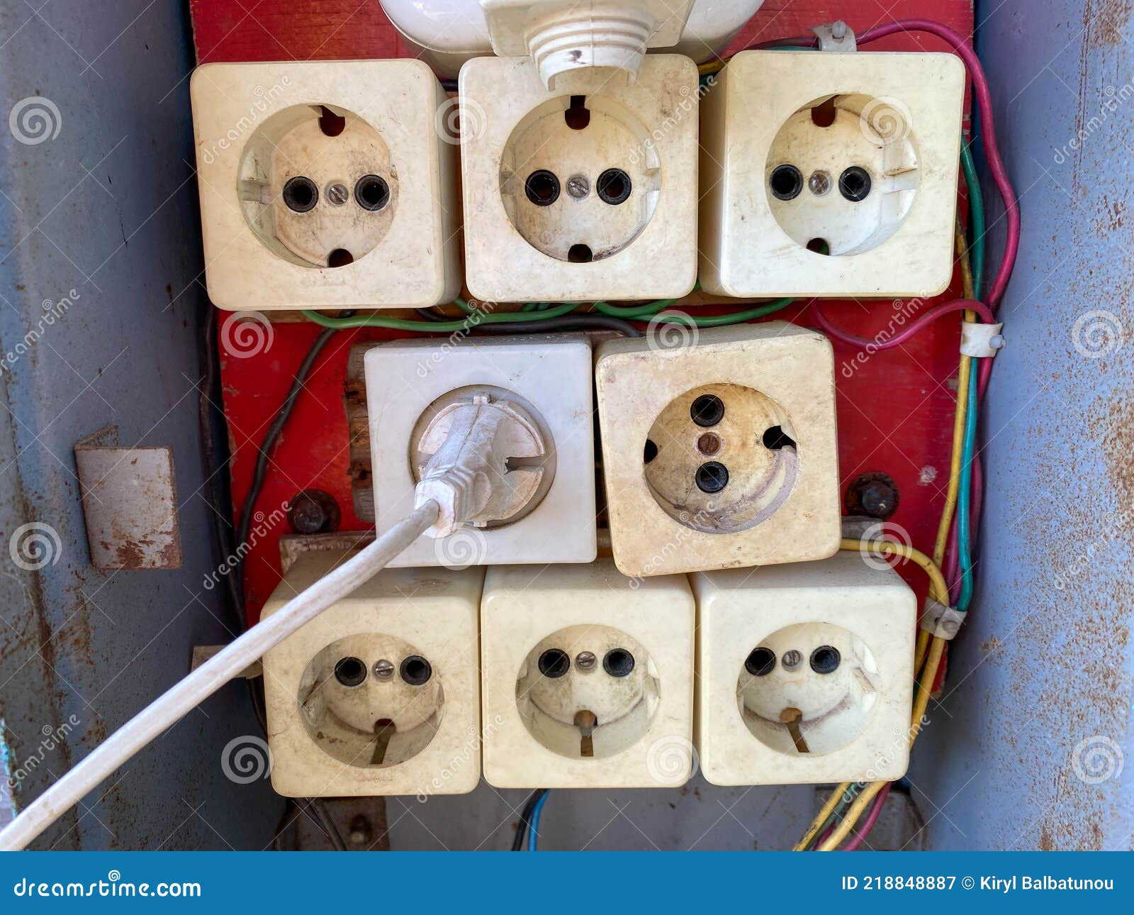 Large White Unprofessionally Installed Many Square Electrical Outlets ...