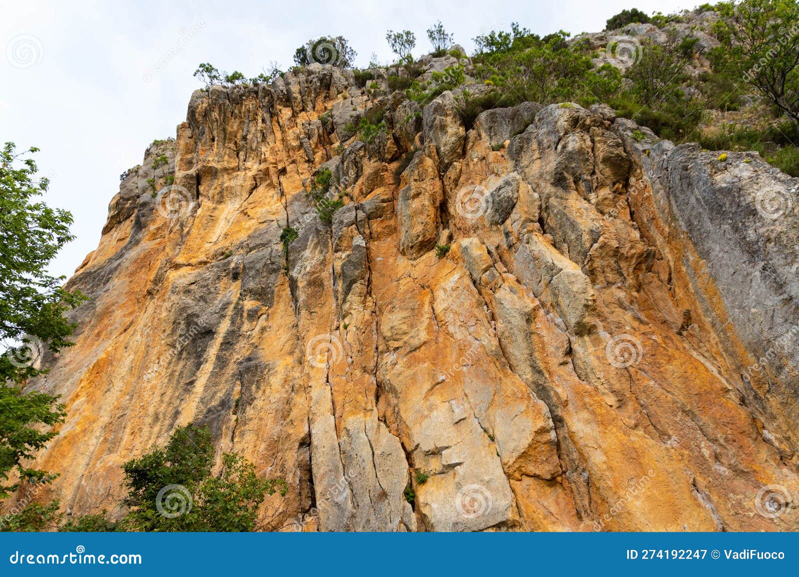 Large Wild Red Limestone Cliffs with Sparse Vegetation Stock Image ...