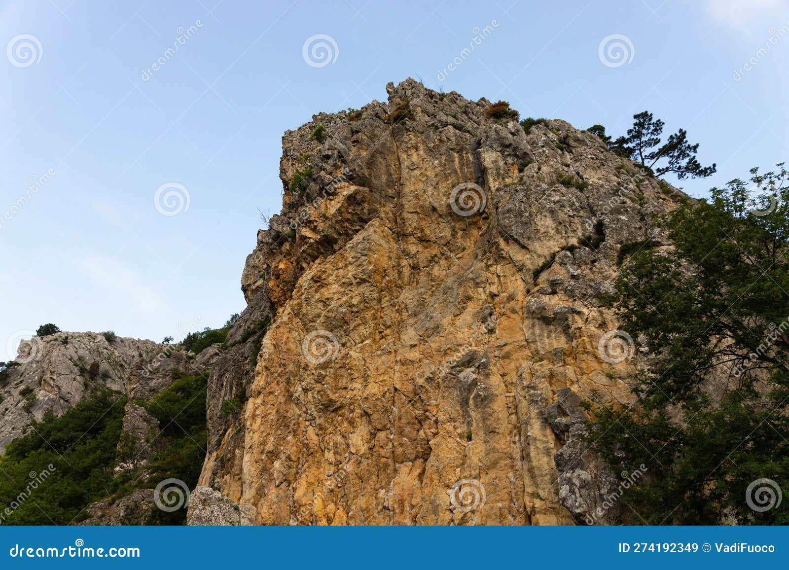 Large Wild Red Limestone Cliffs with Sparse Vegetation Stock Image ...