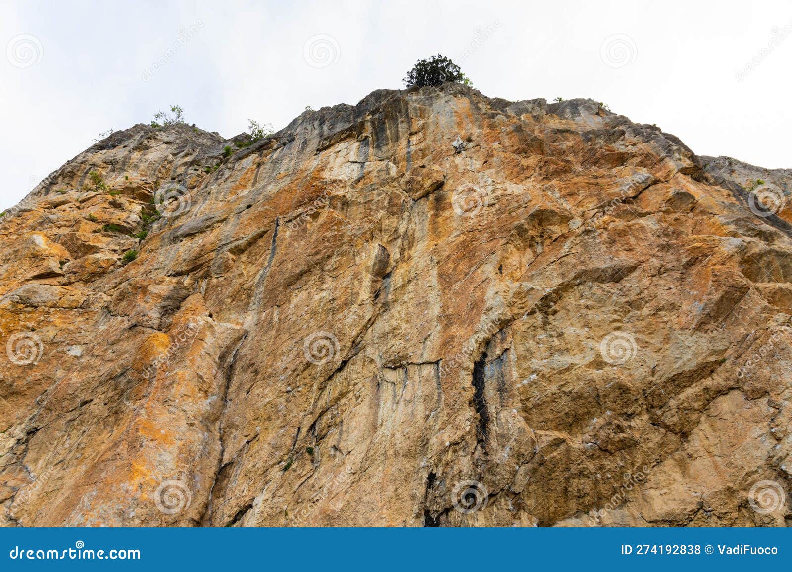 Large Wild Red Limestone Cliffs with Sparse Vegetation Stock Photo ...