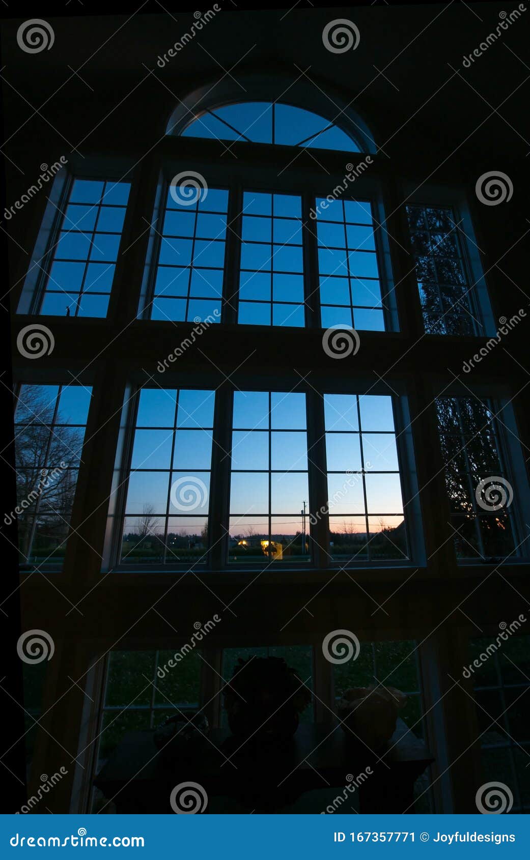 Large window set at sunset stock image. Image of falling - 167357771