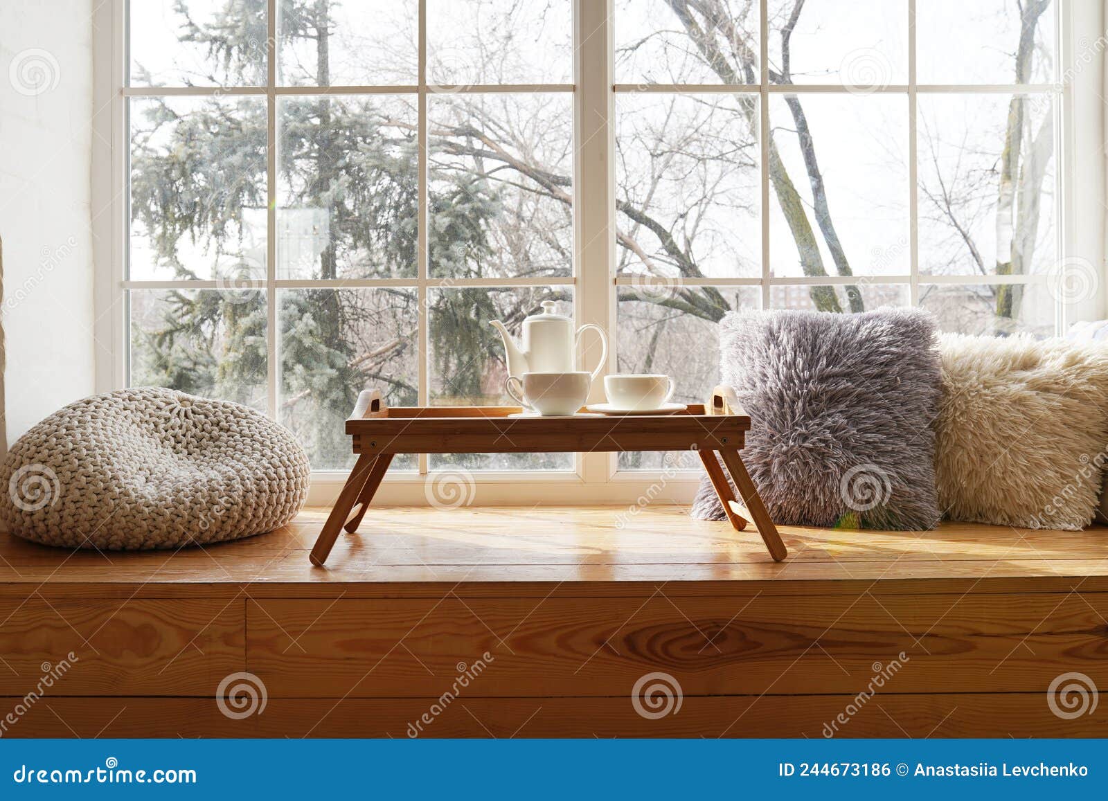 Large Window with a Window Sill with Hot Tea and Cups. the Concept of ...