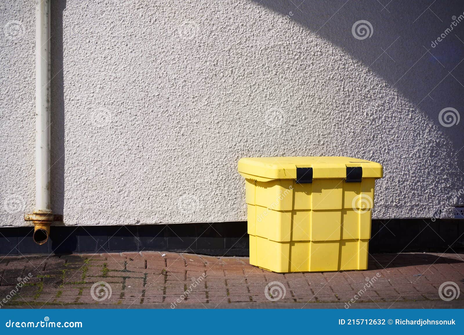 Large Yellow Bin for Rubbish with Secure Lock Stock Photo - Image of ...