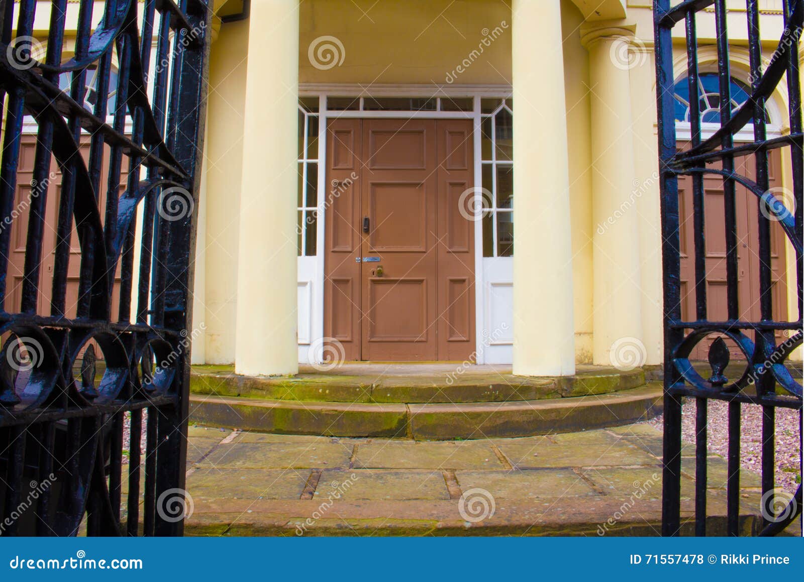 Large Yellow Building with Gates Stock Photo - Image of beautiful ...