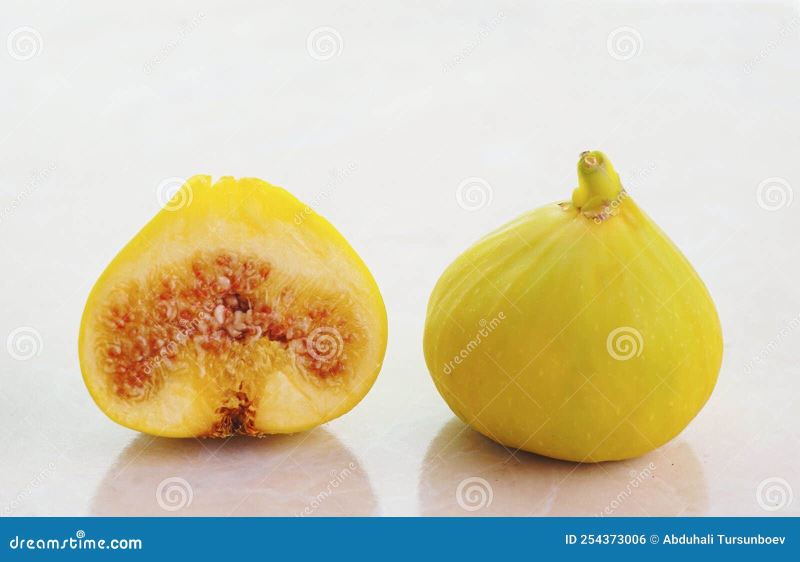 A Large Yellow Fig is Cut into Slices Stock Photo - Image of large ...