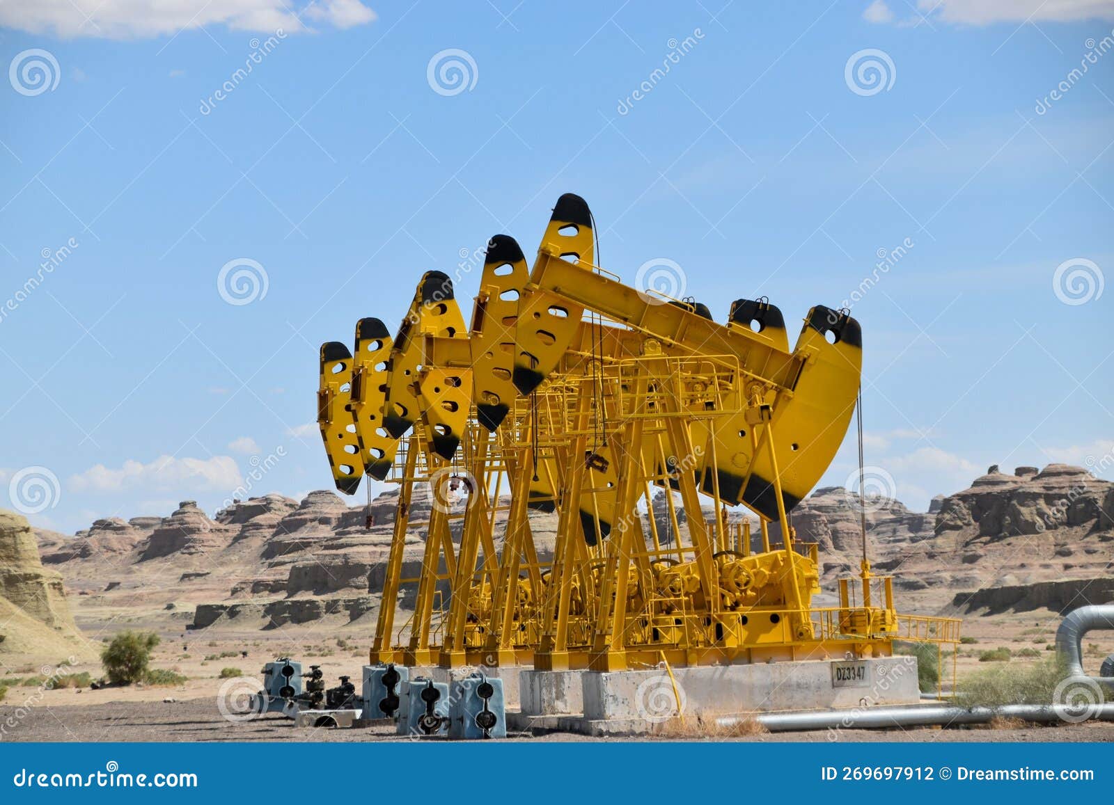 Large Yellow Oil Rigs Industrial Setting, Sky in the Background Stock ...