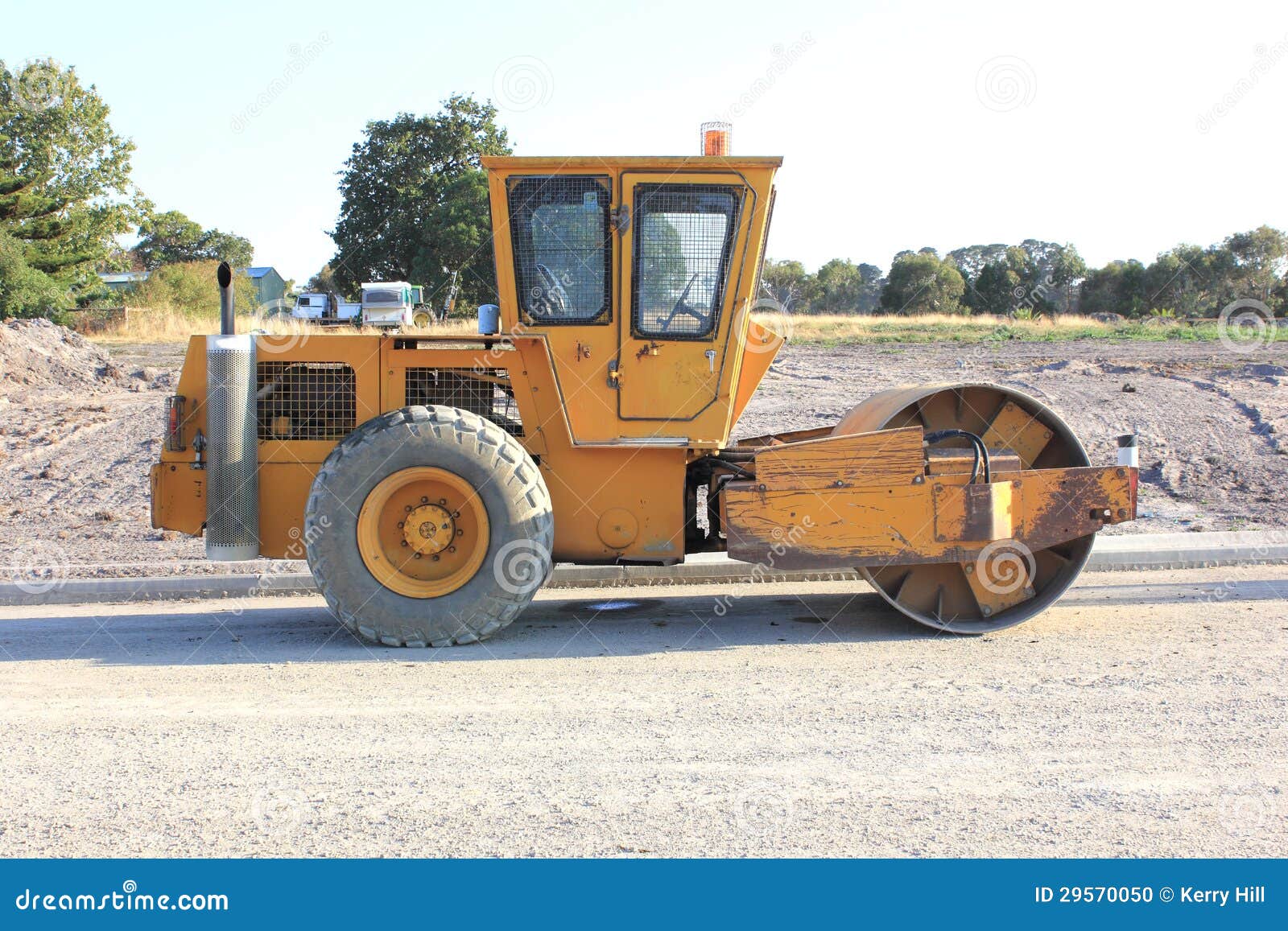 Large Yellow Road Rolling Machine Stock Photo - Image of gravel ...