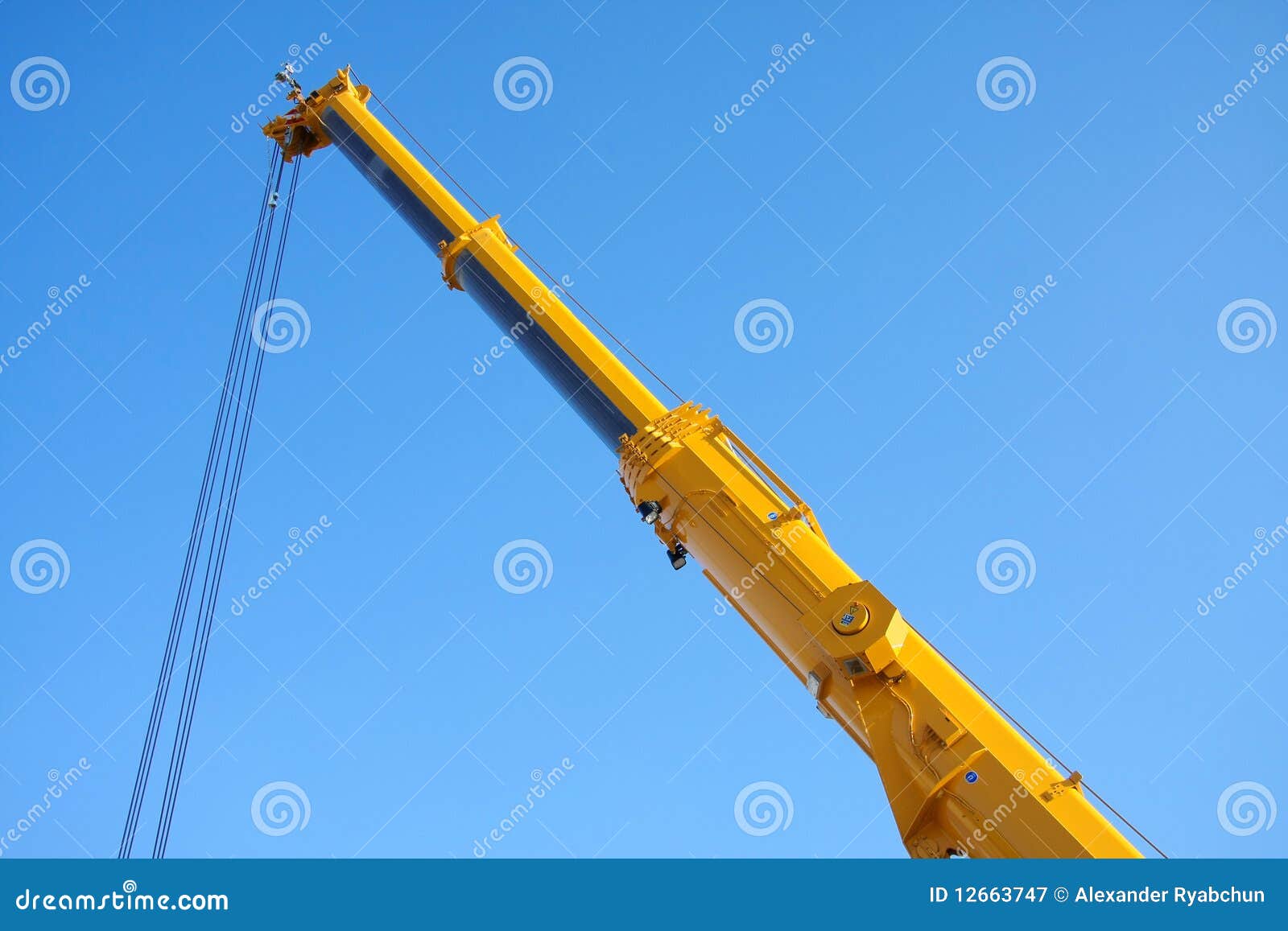 Yellow Telescopic Arm Of A Mobile Crane Operating At A Construction ...