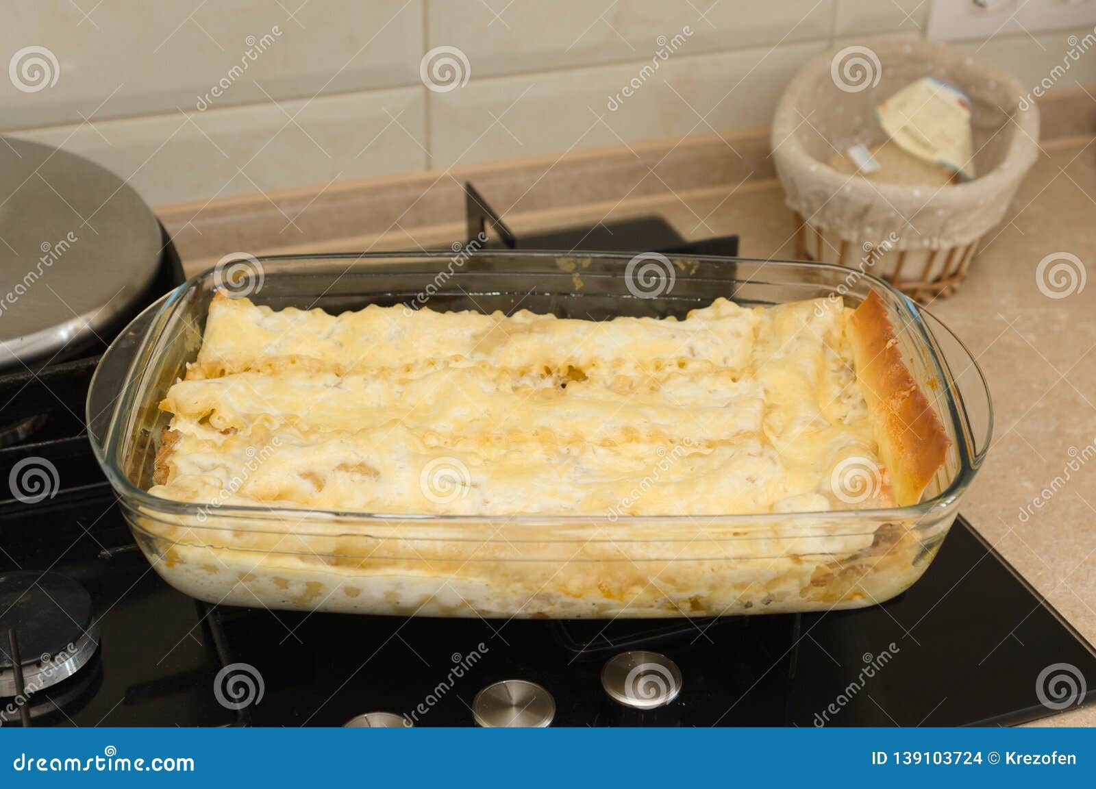 Lasagna Extracted from the Oven in a Glass Container Stock Photo ...