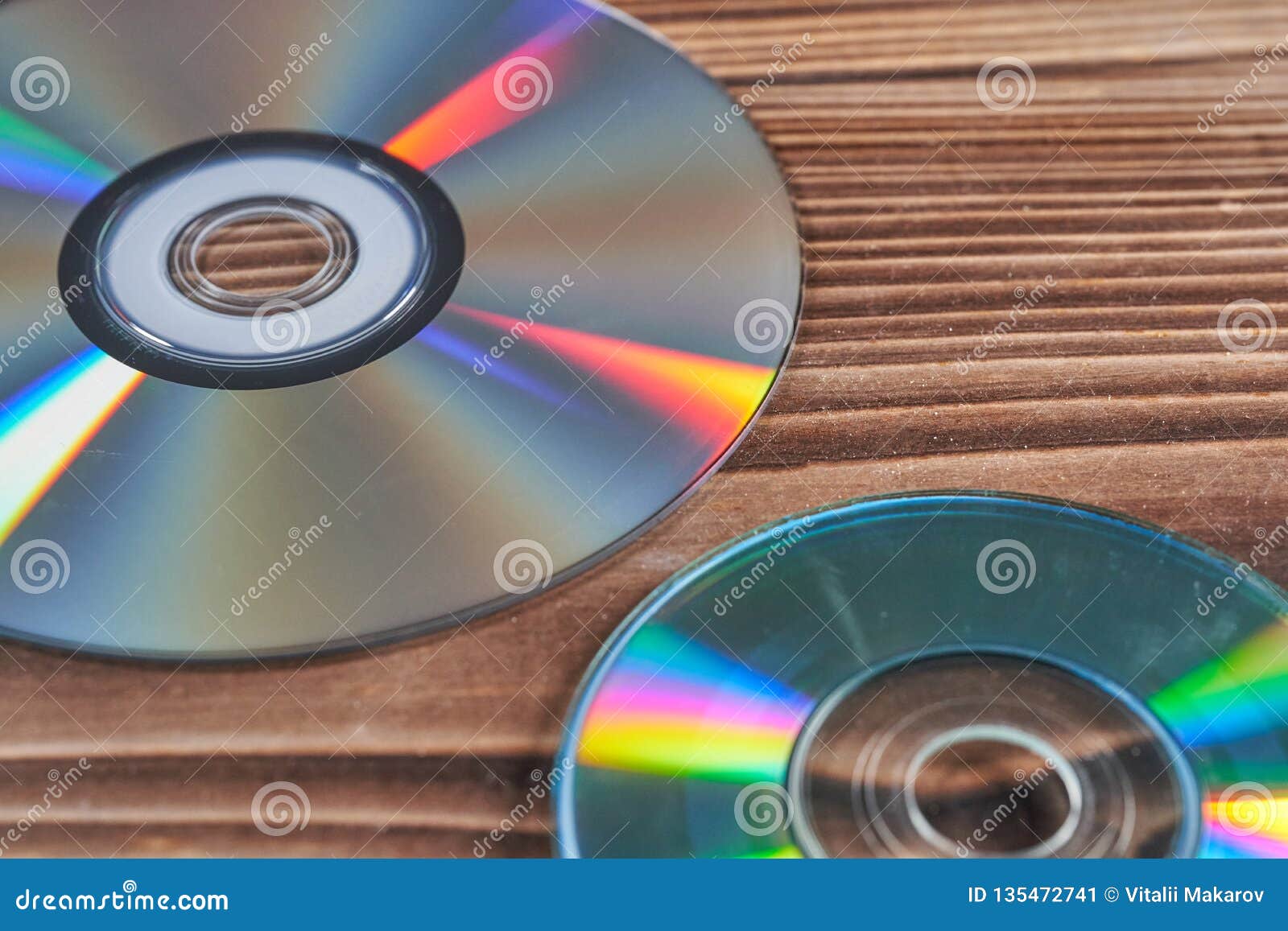 Laser Discs are on a Wooden Table Stock Image - Image of digital ...