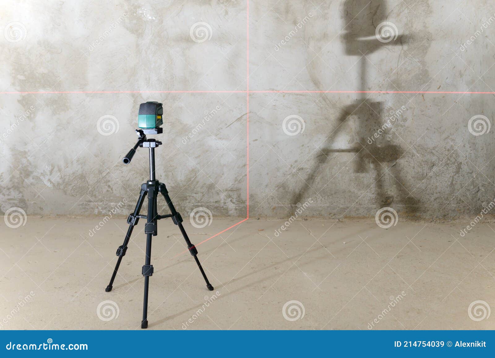 Laser Level Projects Red Lines Onto the Wall with a Rough Finish Stock ...