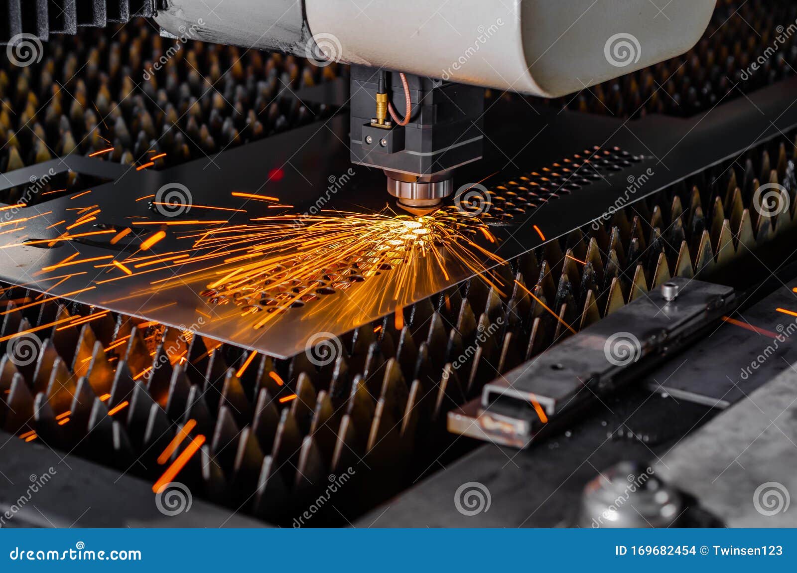 Laser Machine Cuts a Metal Sheet Stock Photo - Image of cuts, laser ...