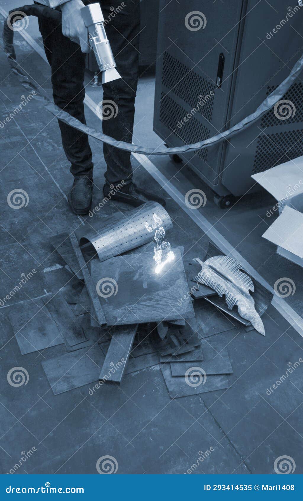Laser Metal Cleaning. Man Using Laser Metal Cleaning Machine Clean ...