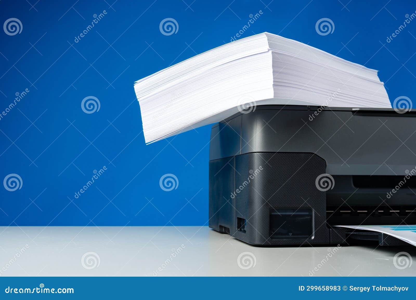 Laser Printer on Desk Against Blue Background. Stock Image - Image of ...