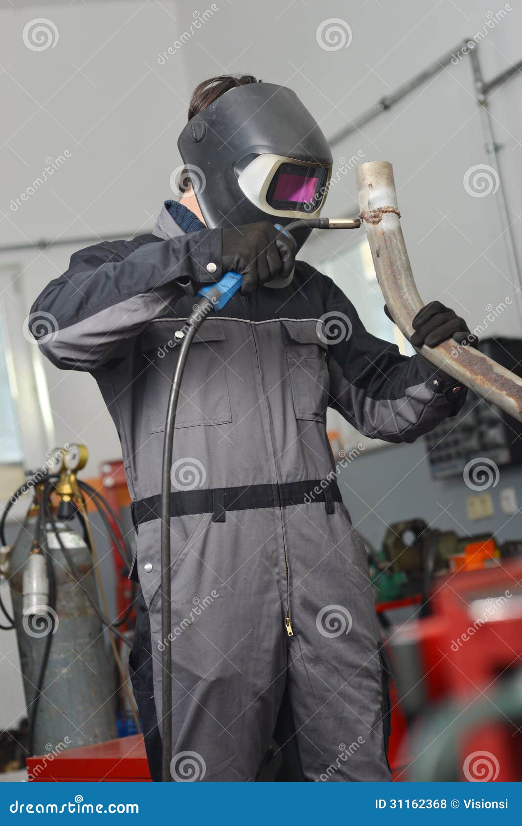 Lasser op het werk stock foto. Image of beschermend, doek - 31162368