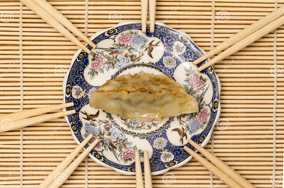 The last dumpling stock image. Image of food, chopsticks - 54604885