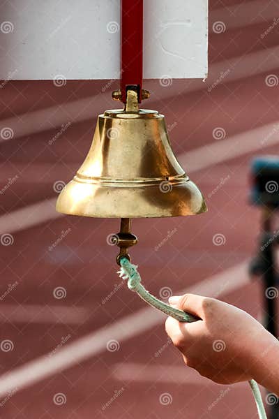 Referee Hand Pulling the Rope of a Bell Stock Image - Image of bronze ...