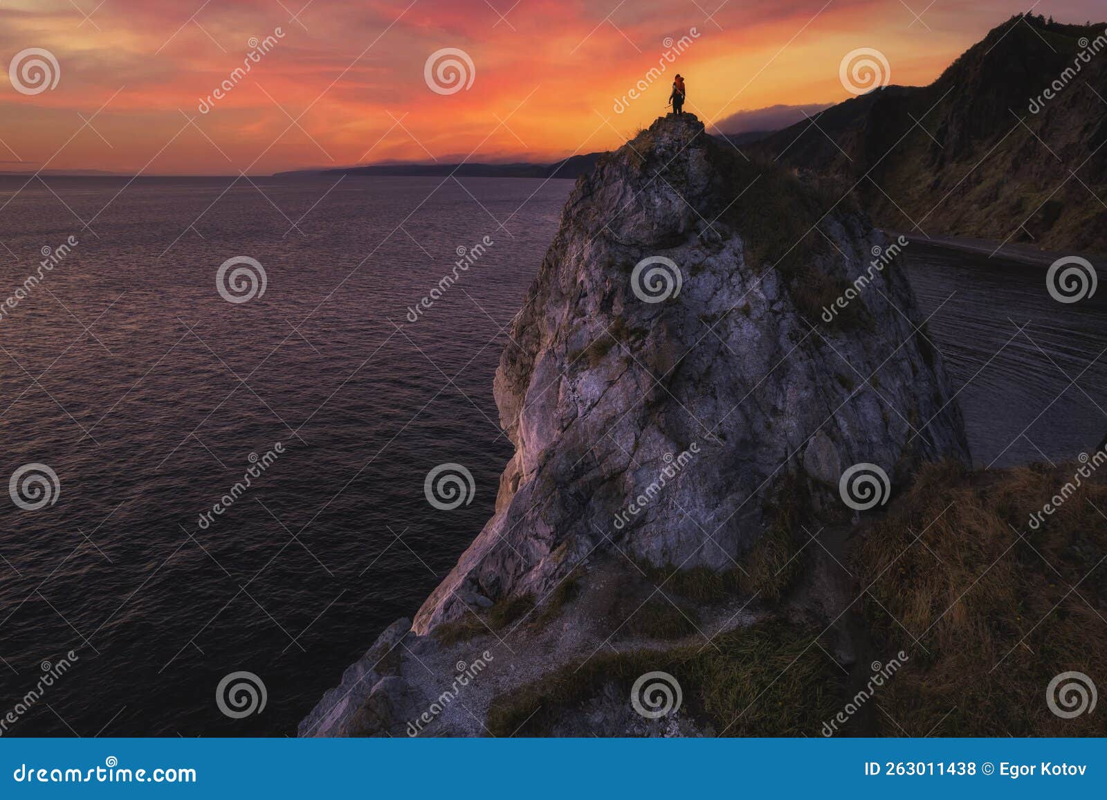 When the Sun Falls into the Ocean Stock Photo - Image of mountains ...