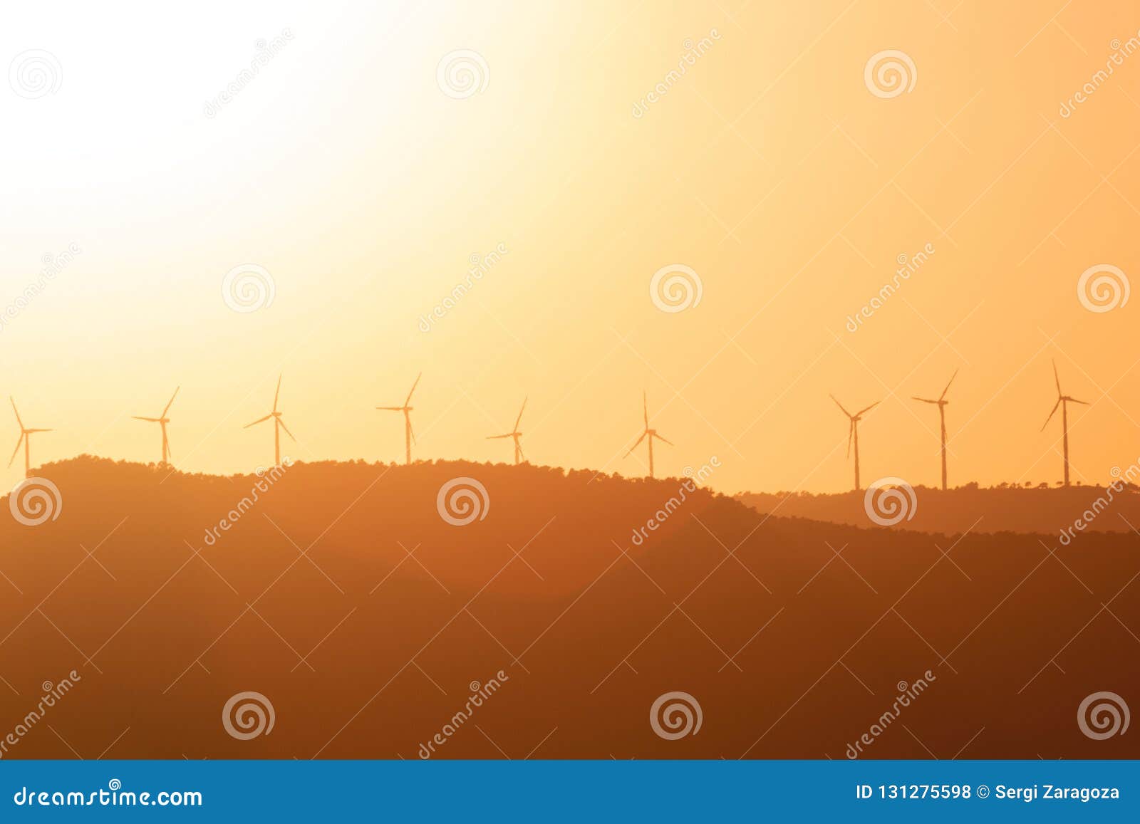 Late Bright Sunset with Windmills on the Horizon Stock Photo - Image of ...