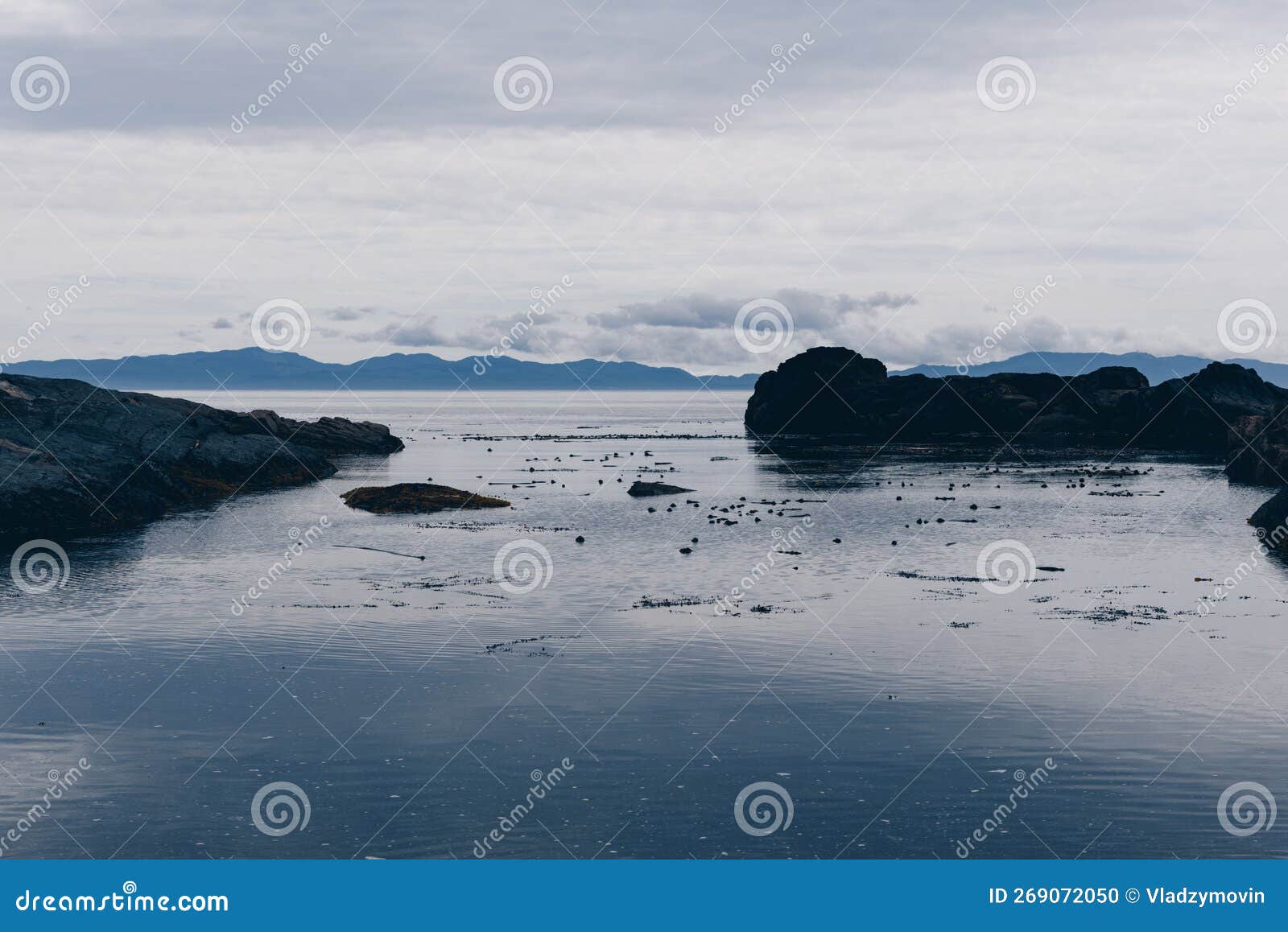 Late Evening on the Ocean Shore Stock Photo - Image of mountains, grey ...